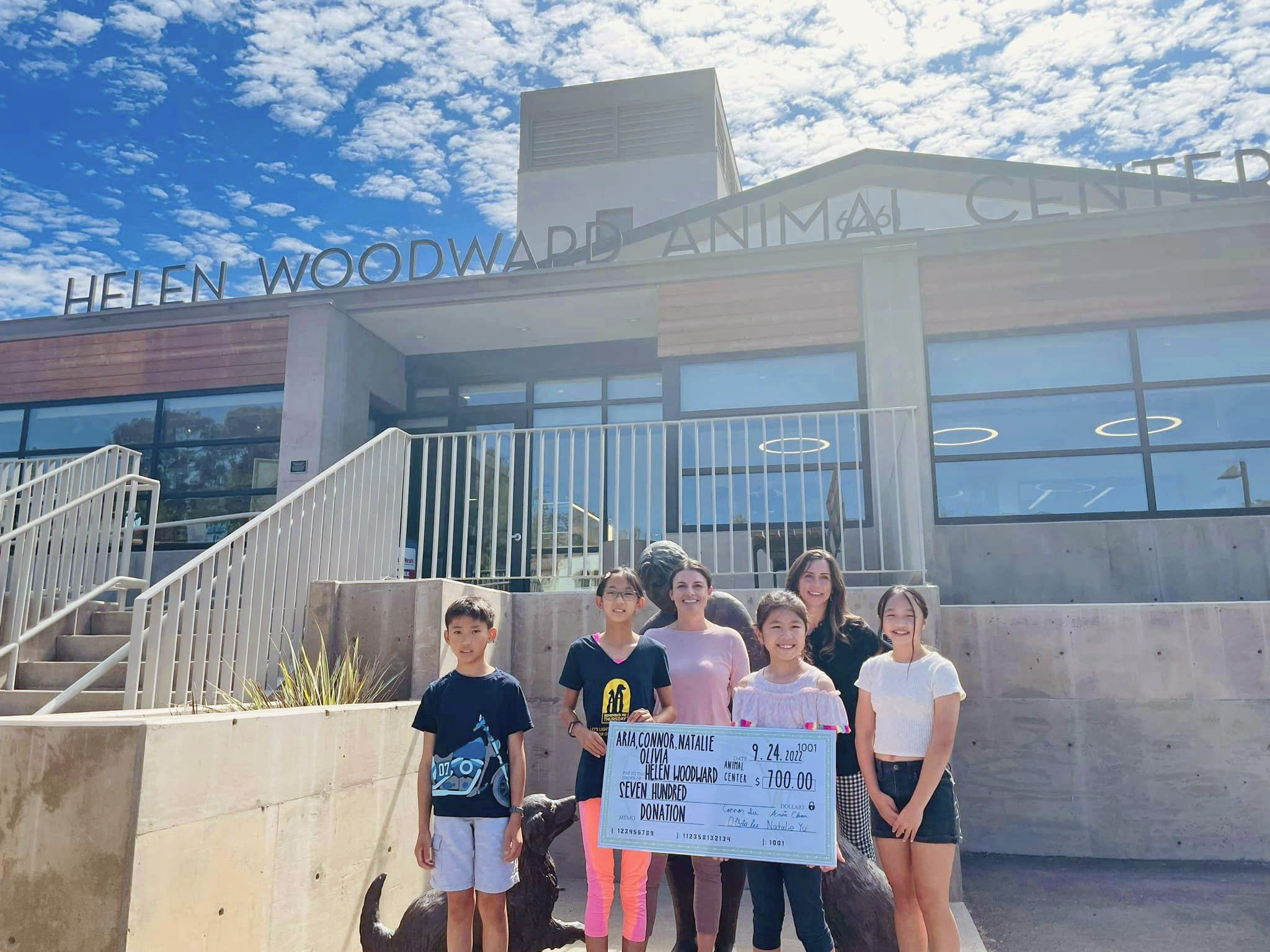 Charity in Harmony: Students Serenade Animals and Present Donation to ...